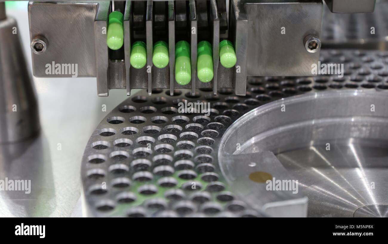 medical capsules packing process by machine ; close up Stock Photo - Alamy