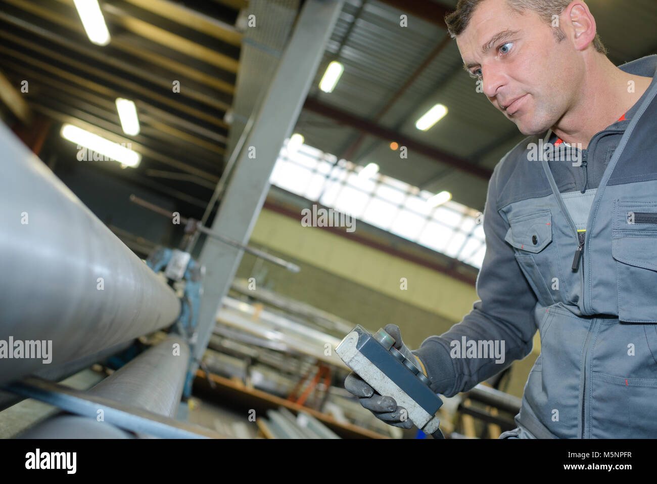 repairing a rolling machine Stock Photo - Alamy