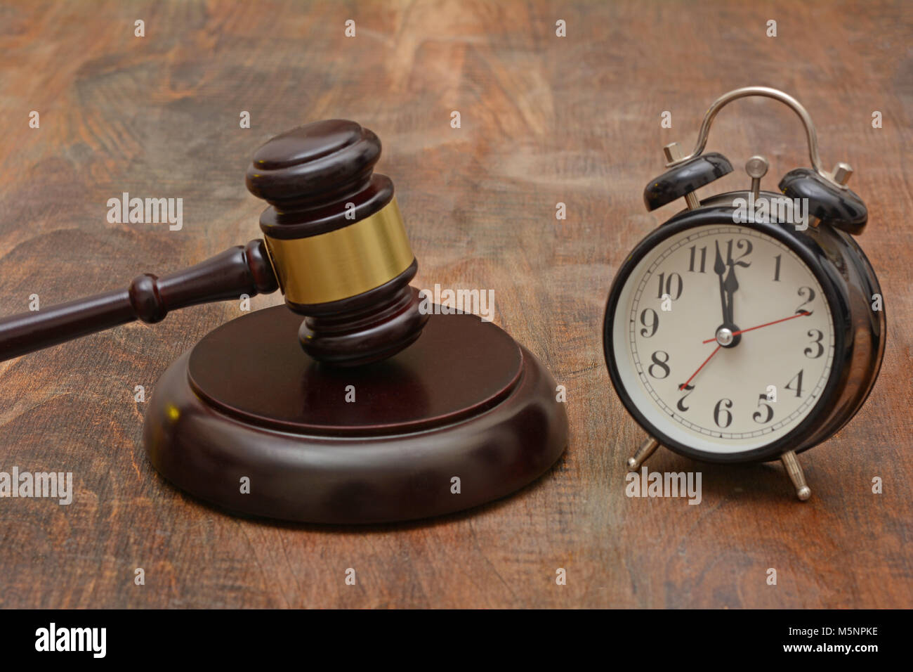 Wooden Gavel with time clock Delay Justice concept Stock Photo - Alamy