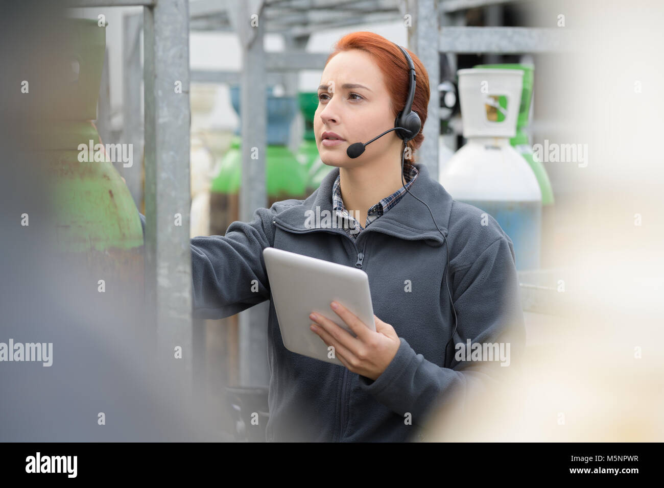 Warehouse manager using tablet hi-res stock photography and images - Alamy