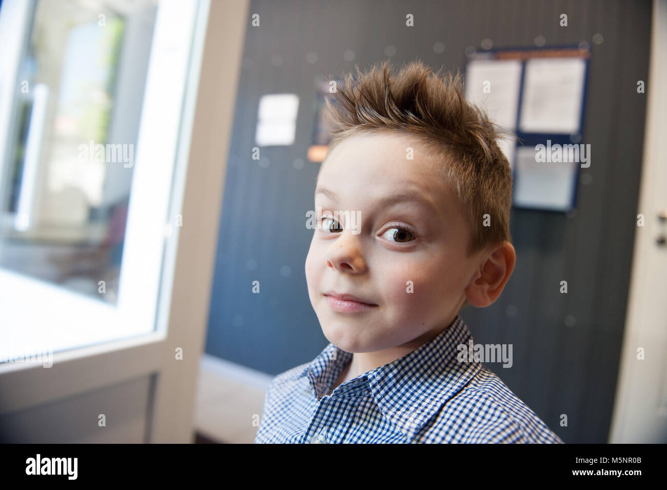 Disheveled boy hi-res stock photography and images - Alamy