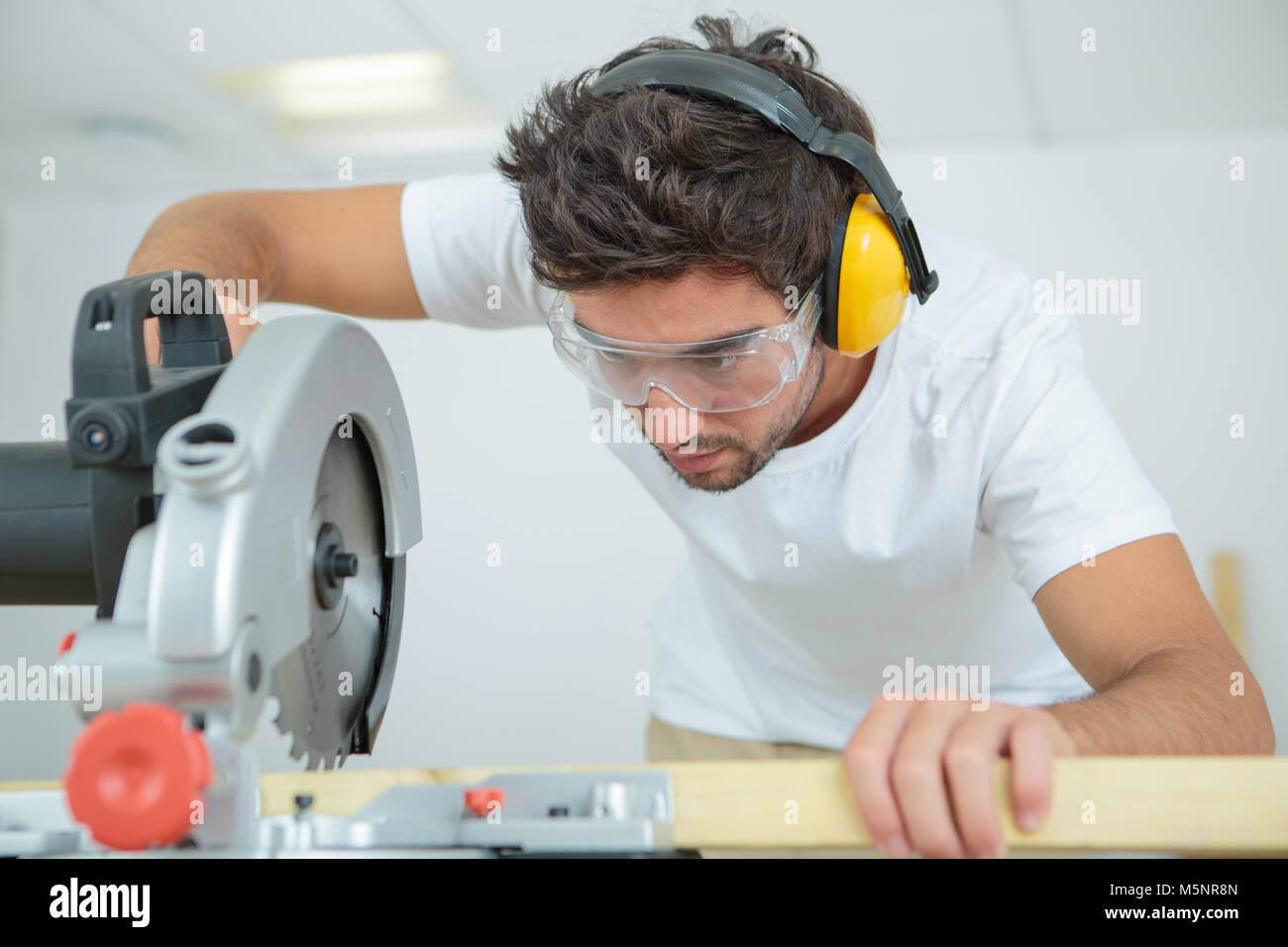 cutting the excess Stock Photo - Alamy