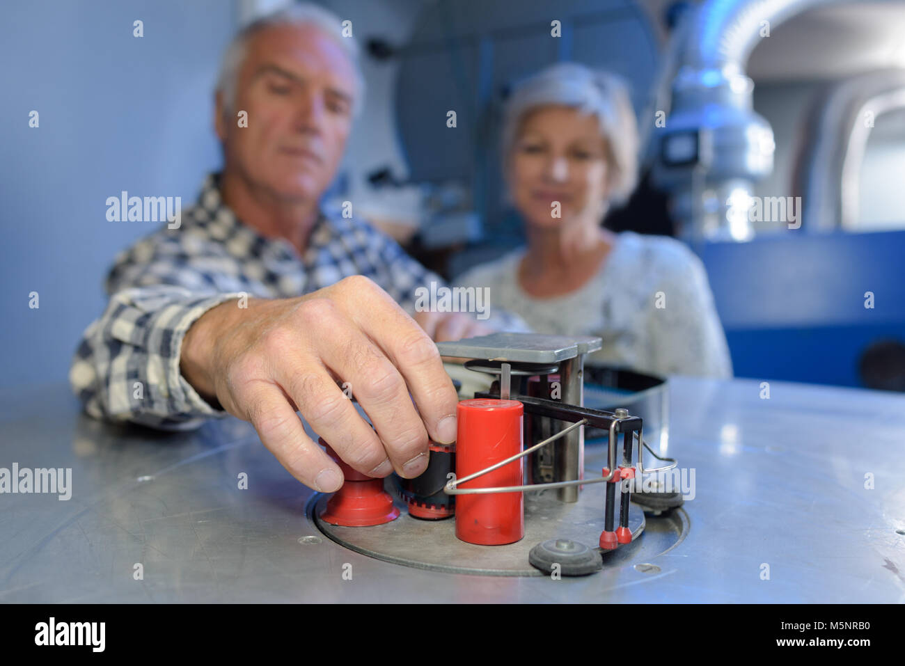 people in engine room Stock Photo - Alamy