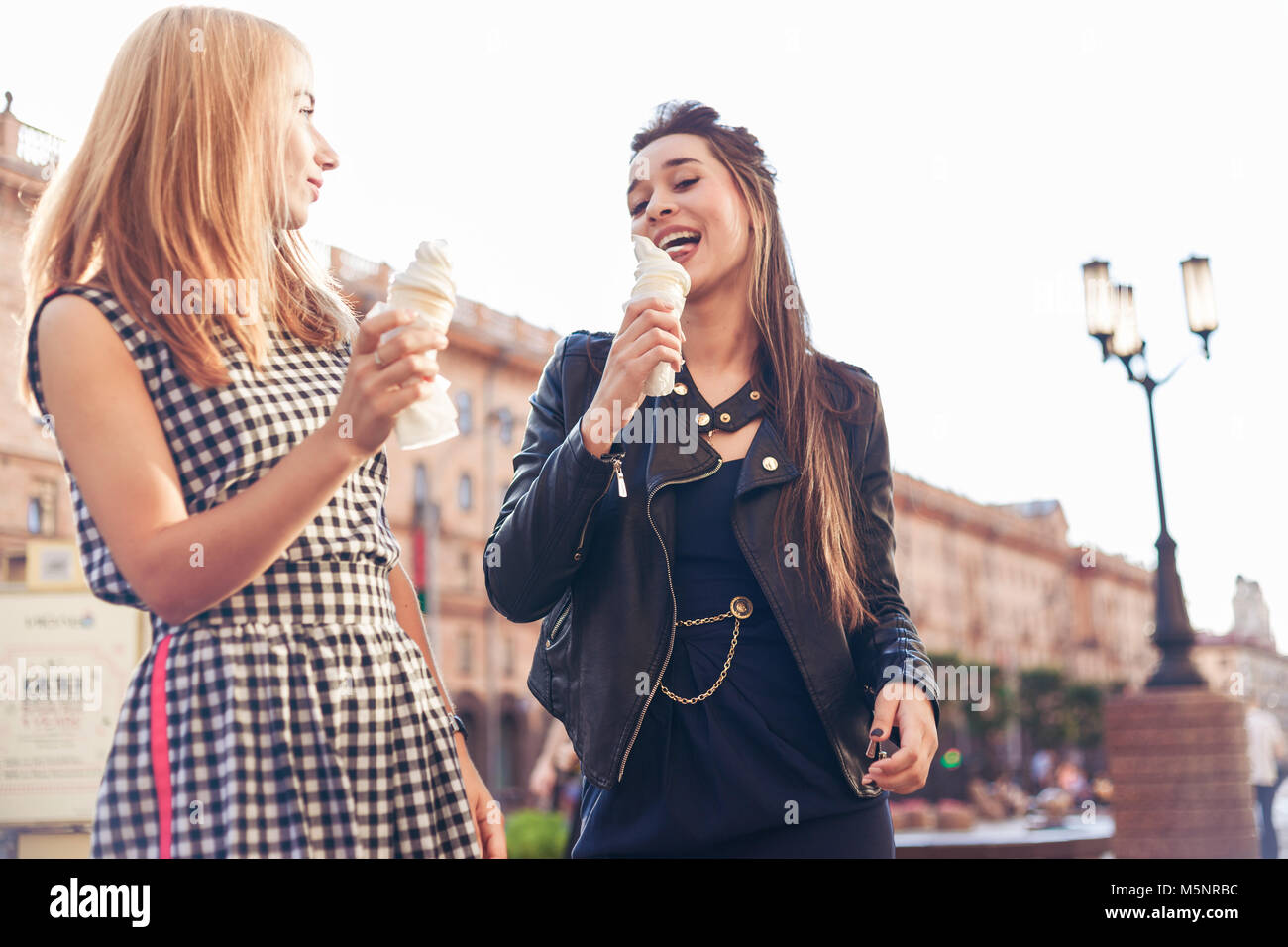 Two Best Friends Having Ice Cream Together Outdoors Young Women Eating