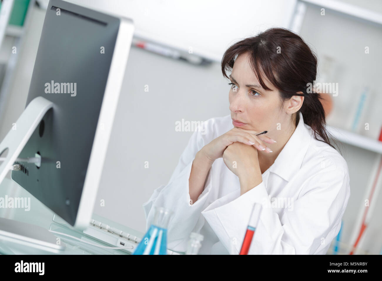 young woman researcher carrying out scientific research Stock Photo - Alamy