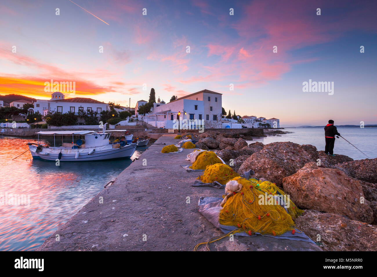 Traditional fishing boats in the harbour of Spetses, Greece Stock Photo ...