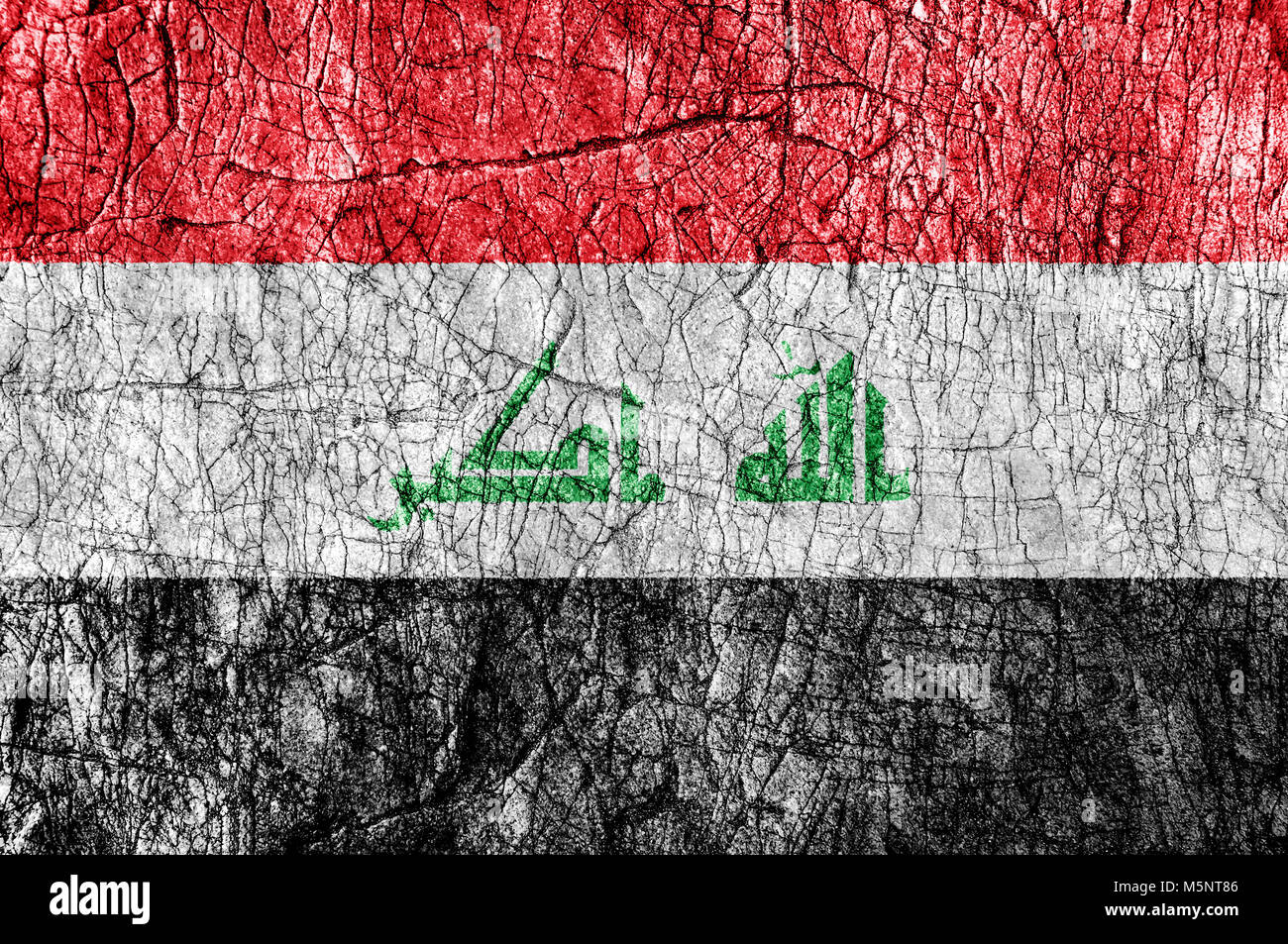 Grudge stone painted Iraq flag Stock Photo - Alamy