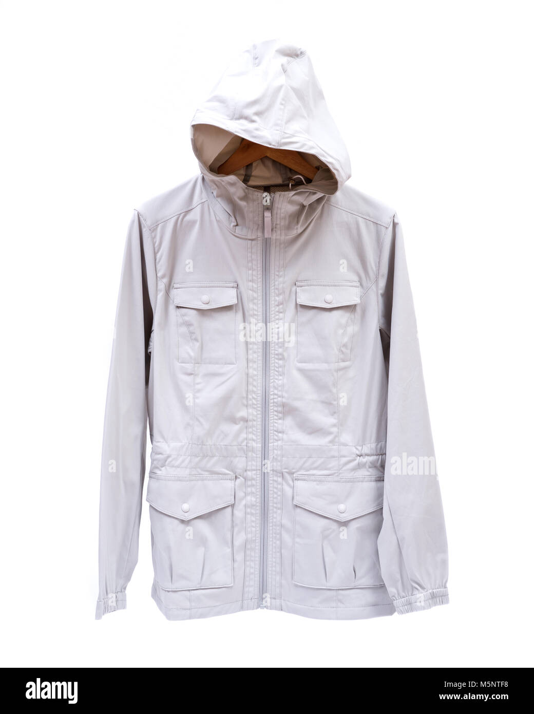 Beige woman's rain jacket isolated on white background Stock Photo - Alamy