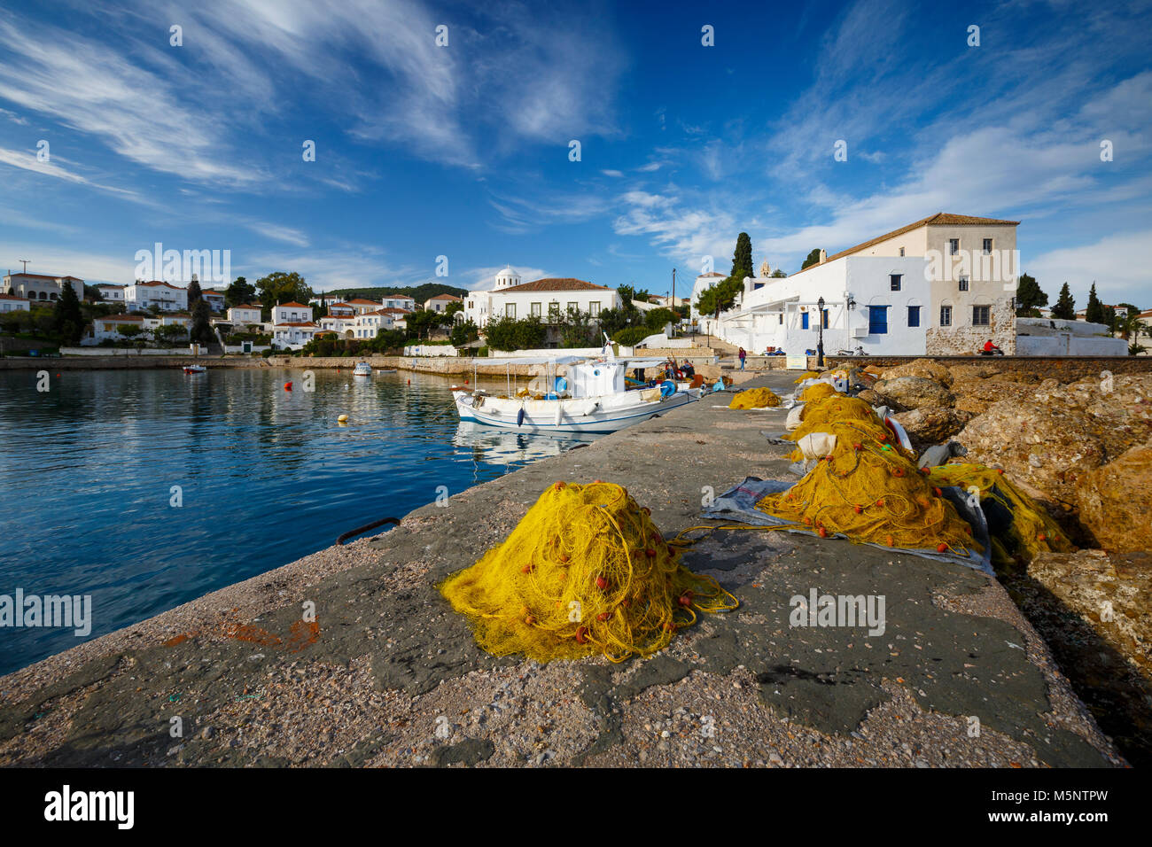 View of the Spetses seafront from the harbor pier, Greece Stock Photo ...