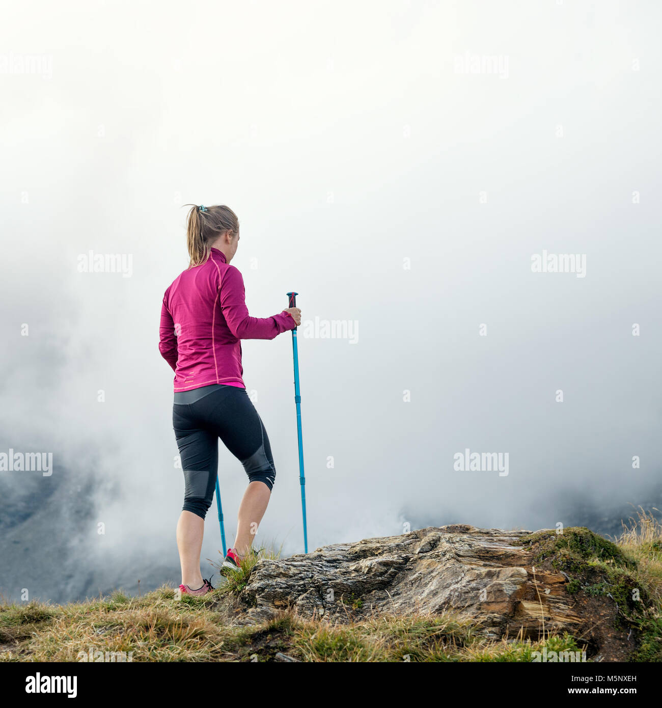 Young woman without backpack hiking in the mountains. Alps. Austria ...