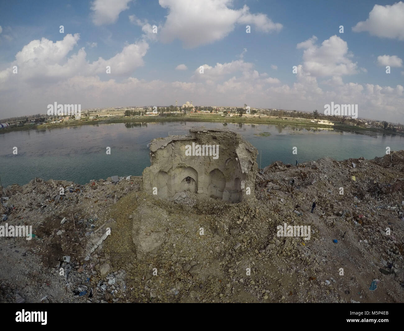 The destruction in an area of the Iraqi city of Mosul along the Tigris ...
