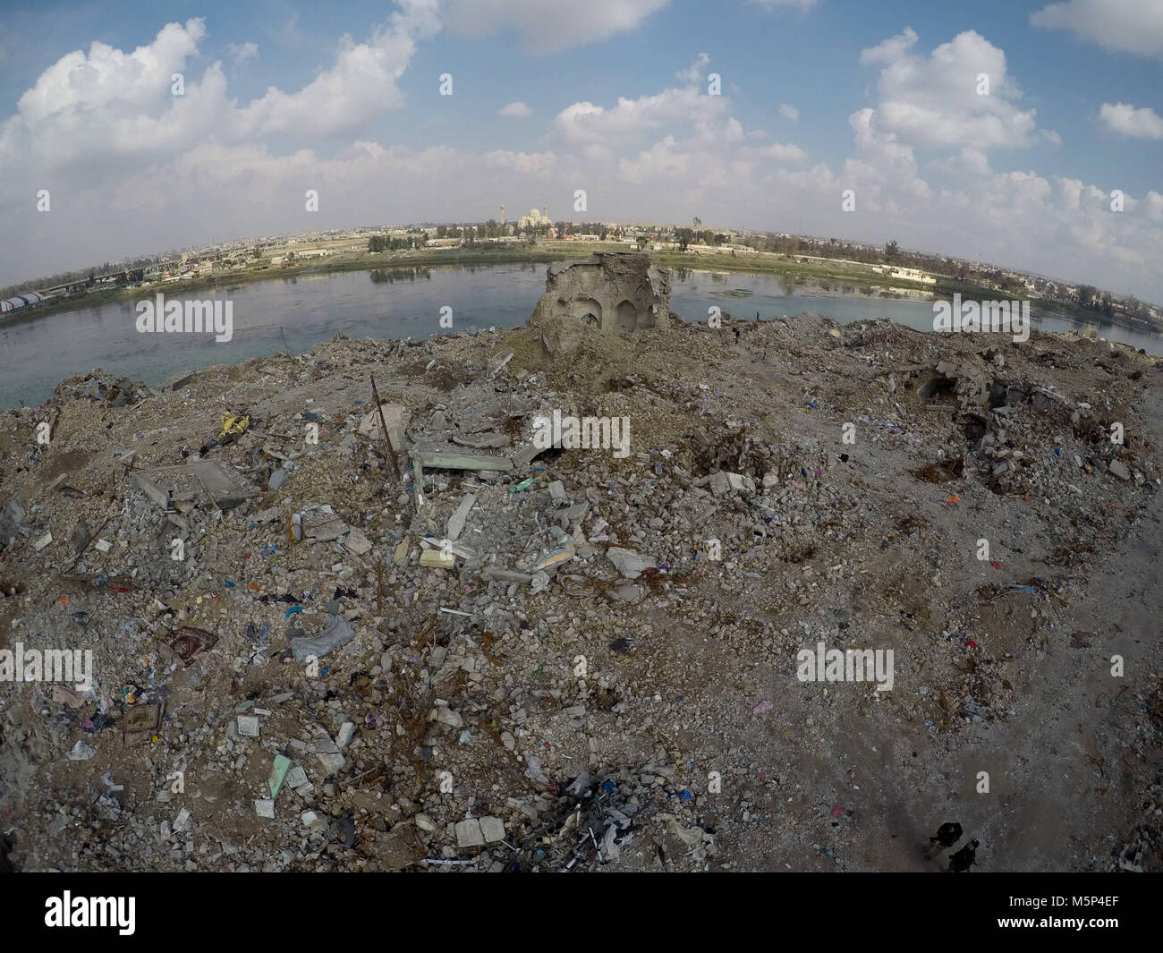 The destruction in an area of the Iraqi city of Mosul along the Tigris ...