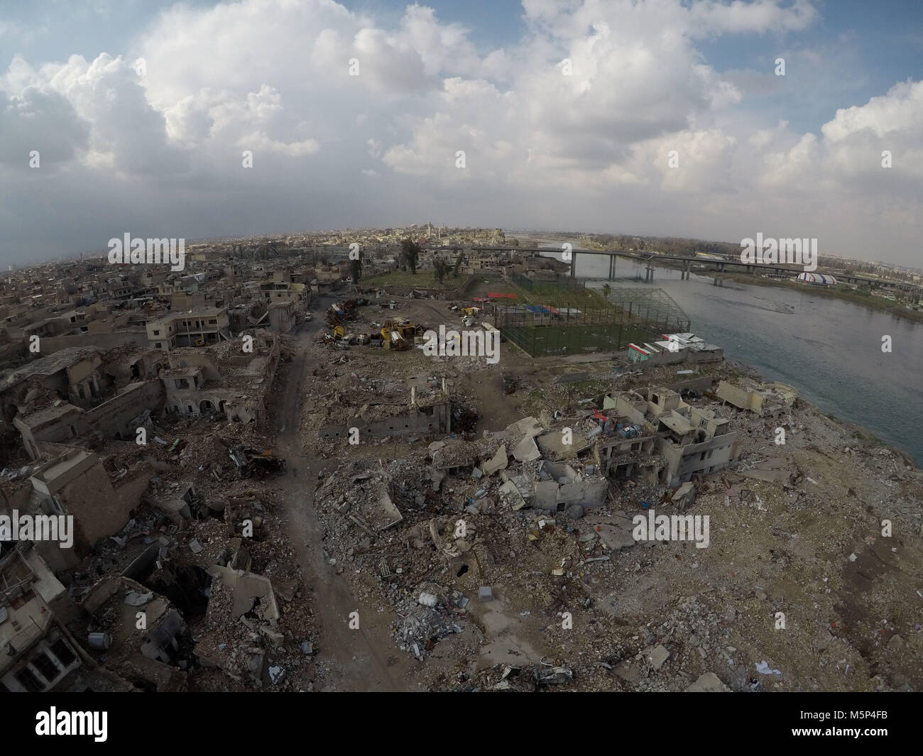 The destruction in an area of the Iraqi city of Mosul along the Tigris ...