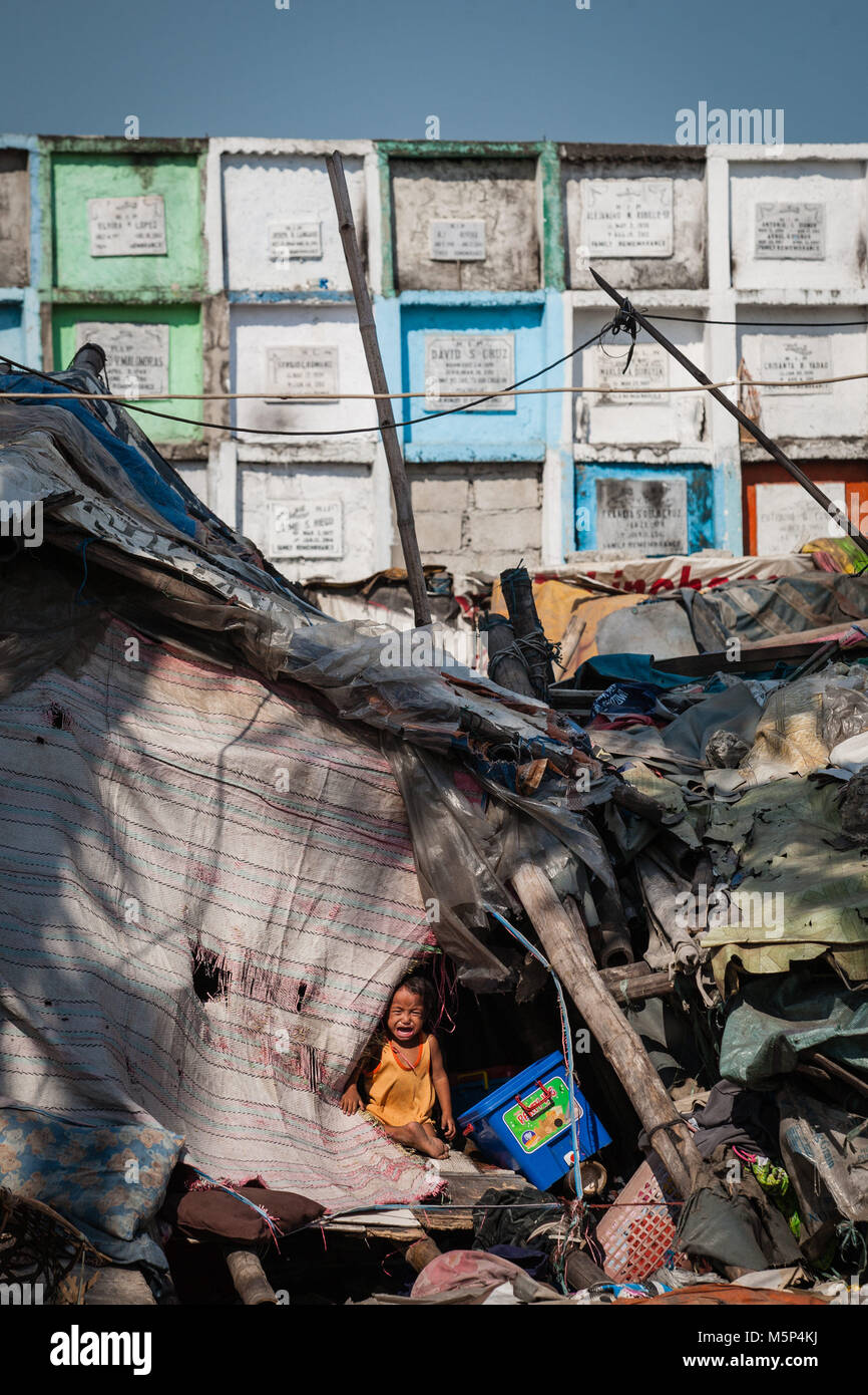 Navotas, Manila, Philippines. 8th Apr, 2015. A house and children seen ...