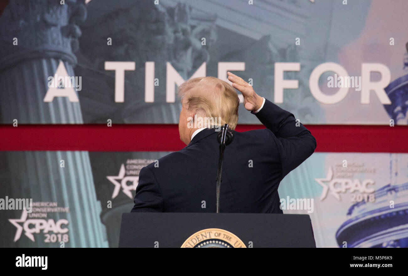 President Donald Trump adjusts his hair at the beginning of a 75 minute ...