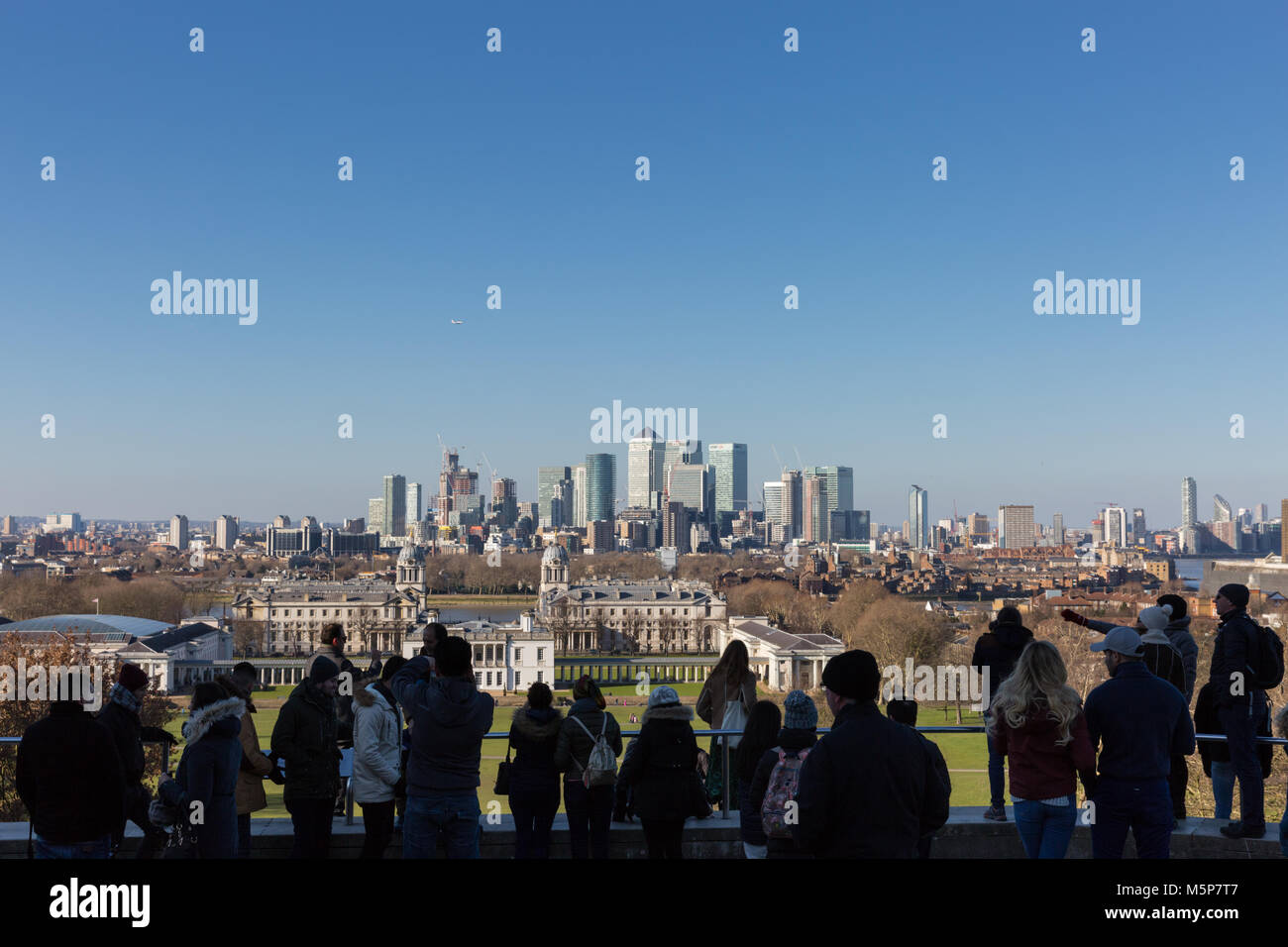 Greenwich, London, 25th Feb 2018. Visitors admire the panoramic views ...