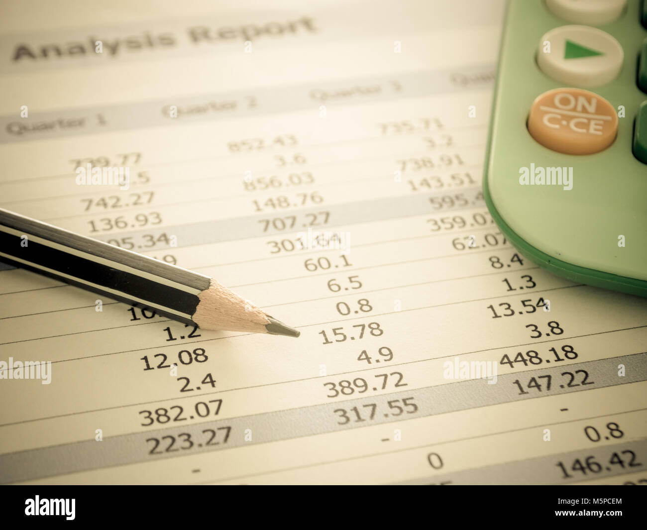 Marketer's desk with analysis Report ,Calculator, pencil Stock Photo ...
