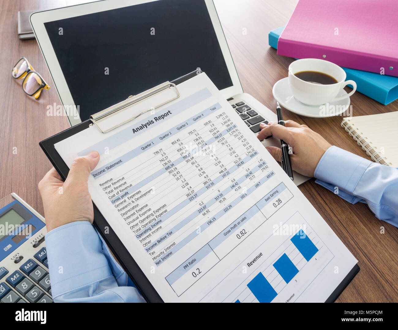 Investors are analyzing data for decision making Stock Photo - Alamy