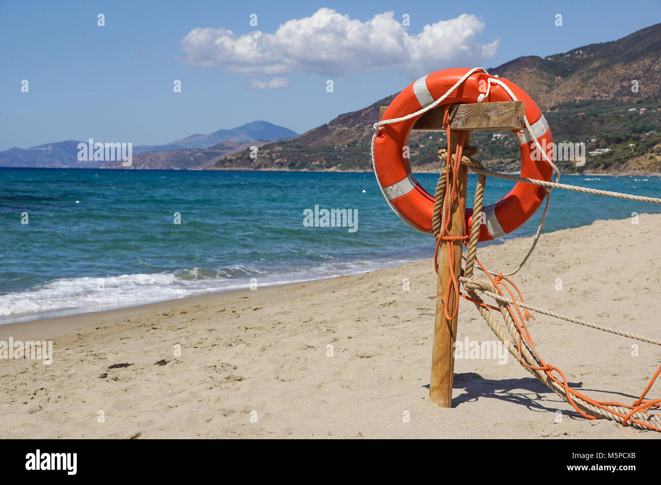 Life preserver on sandy hi-res stock photography and images - Alamy