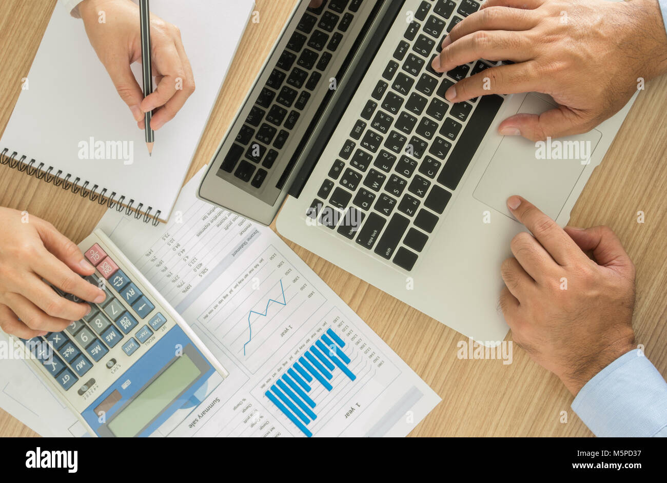 Businessmen are analyzing the data to business planning. top view Stock ...