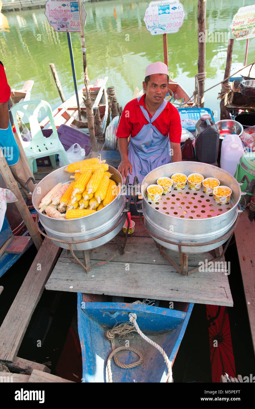 Man selling sweet corn at Klong Hae floating market, Hatyai, Thailand ...