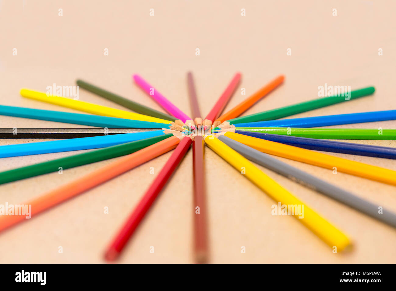 Ring of pencils isolated on a light background. Multicolored pencils ...