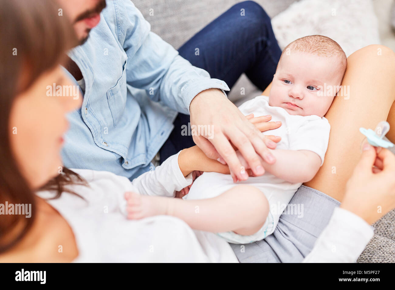 Newborn baby parents hands hi-res stock photography and images - Alamy