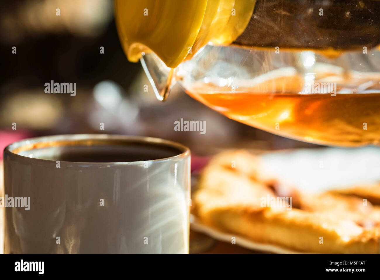 Delicious tea pouring cup hi-res stock photography and images - Alamy
