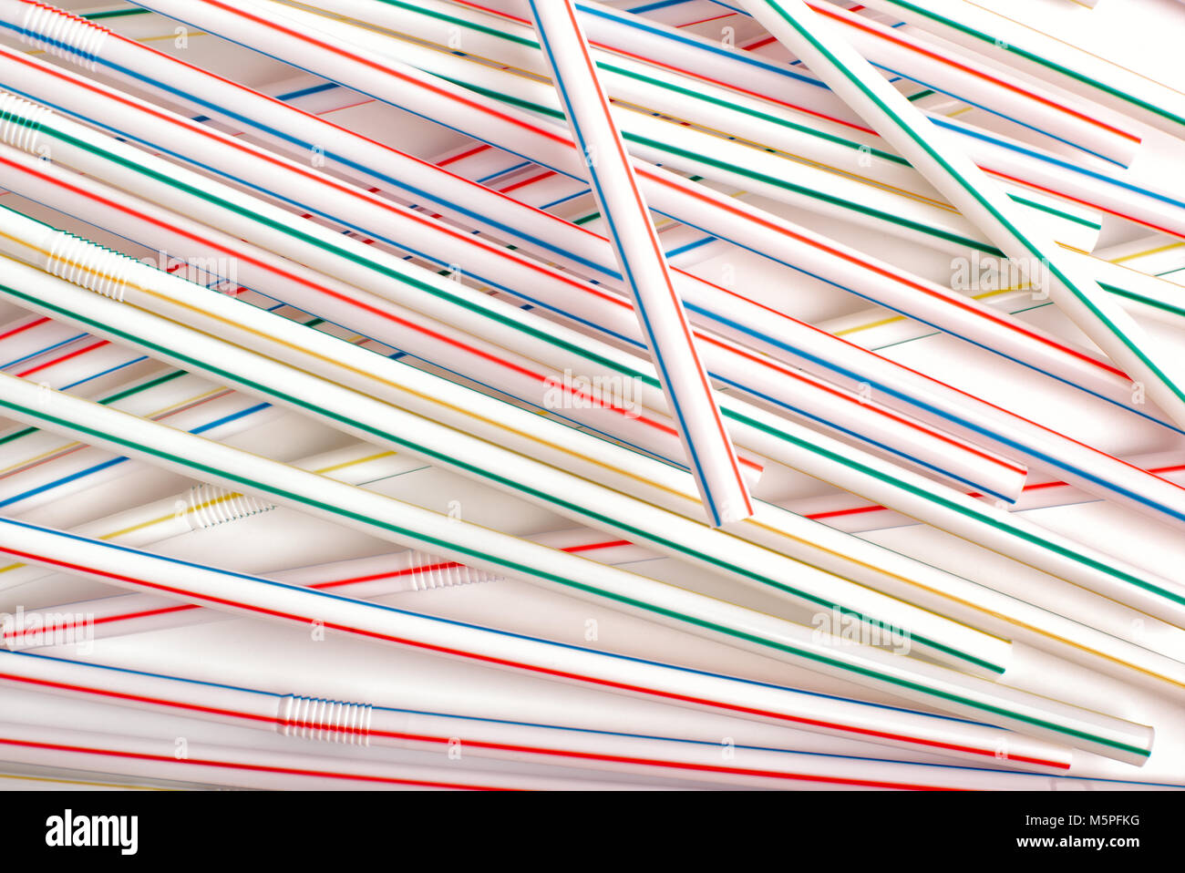 Drinking straw colorful plastic tubes over white background Stock Photo ...