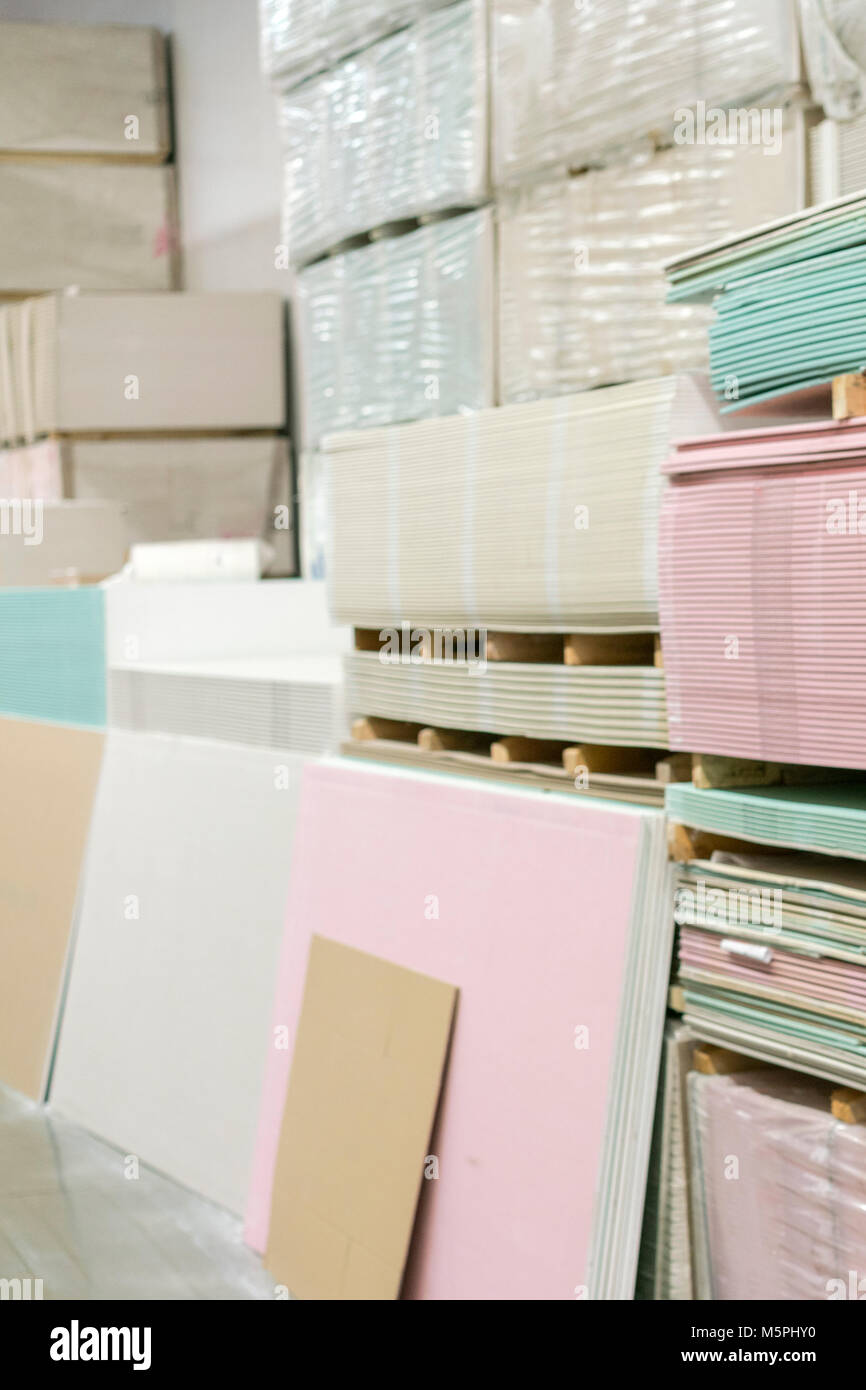 Warehouse with plasterboard. sheets of plasterboard on pallets Stock ...