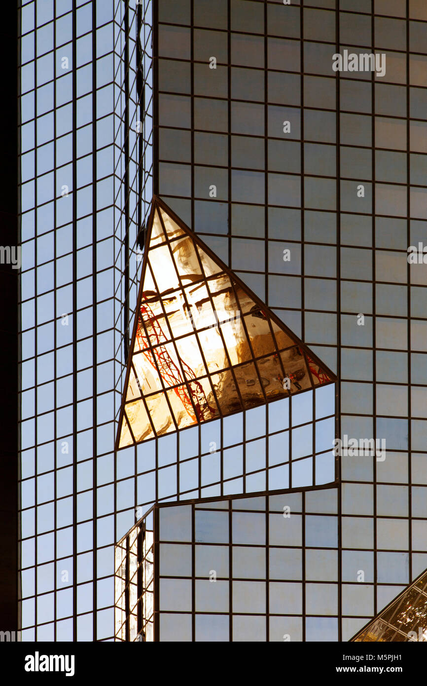 A close up shot of a modern glass building skyscraper and its ...