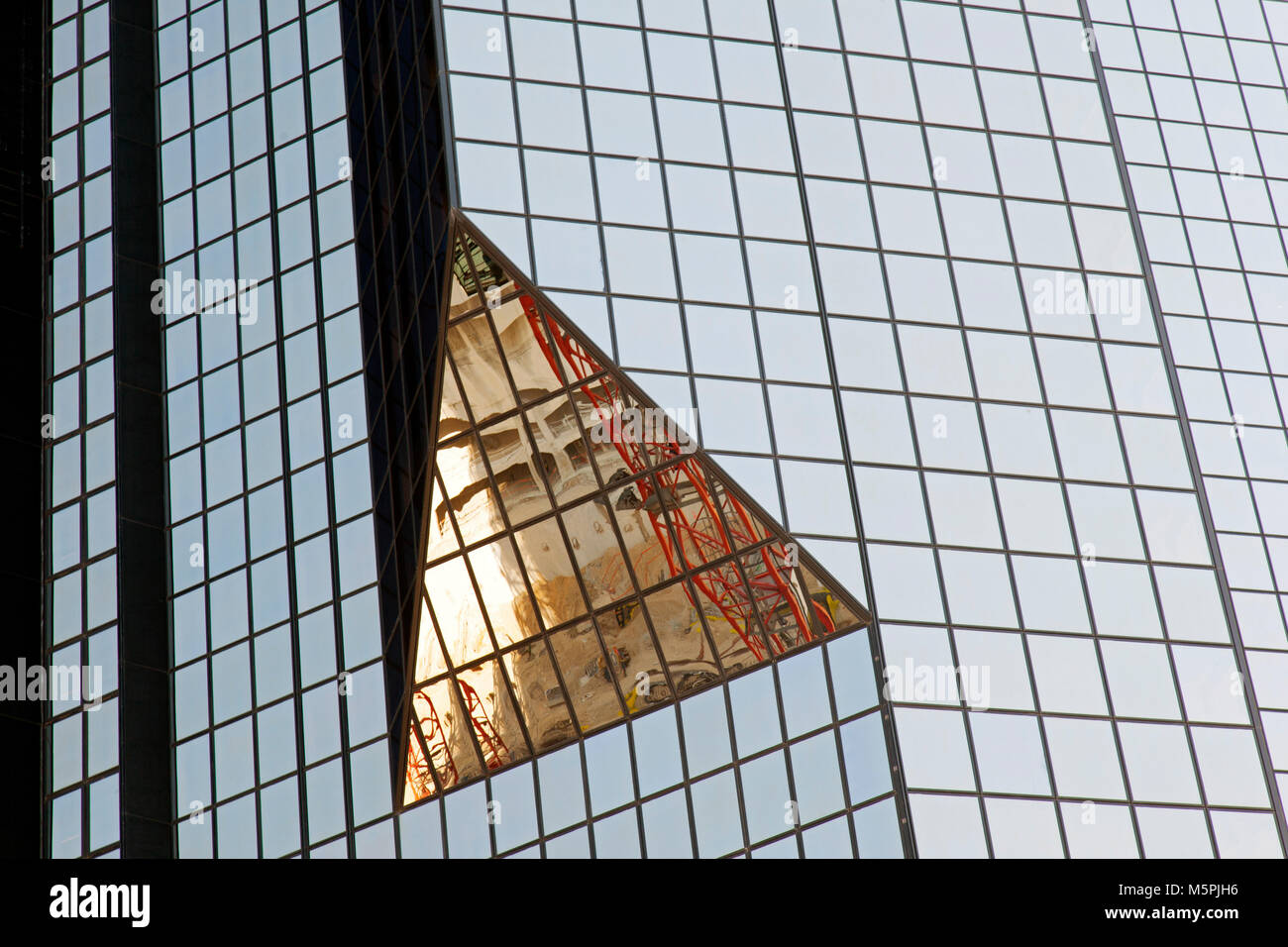 A close up shot of a modern glass building skyscraper and its ...