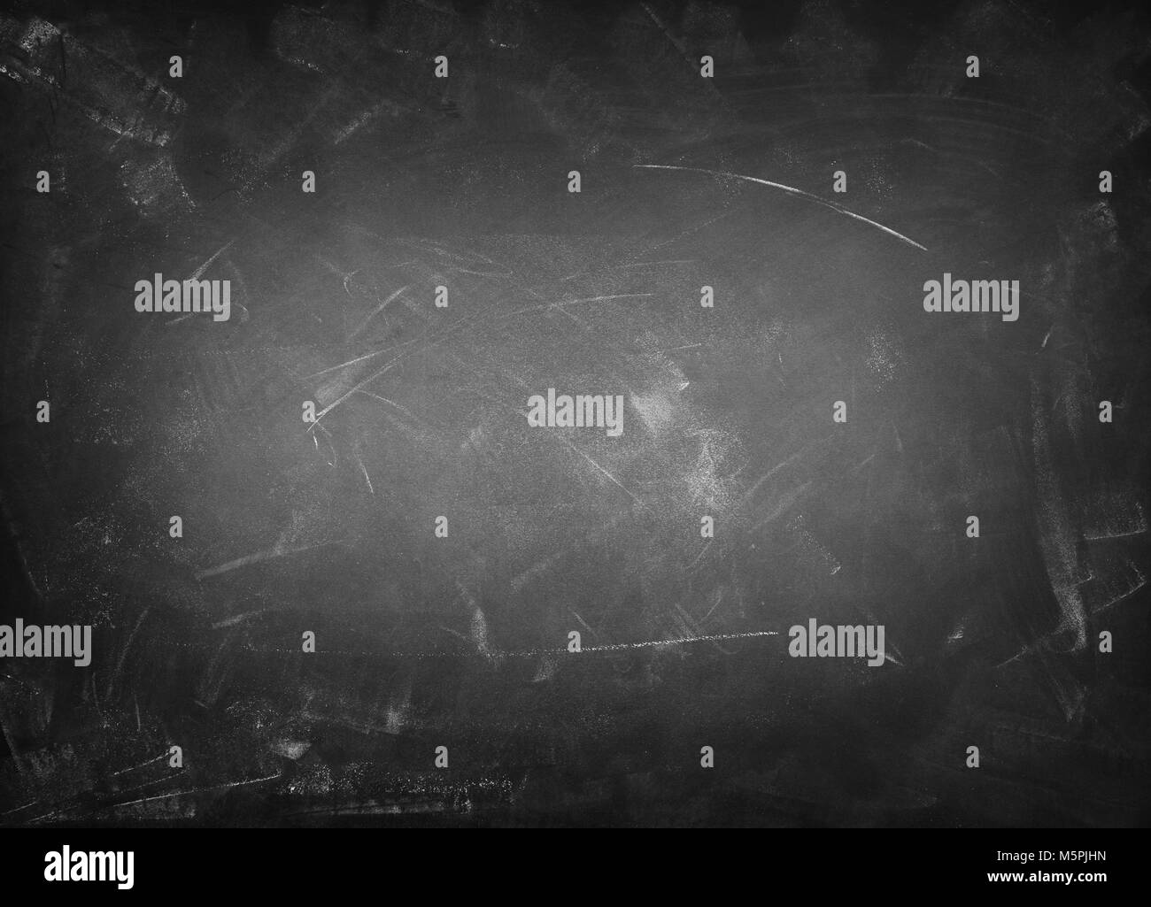 Chalk rubbed out on blackboard background Stock Photo - Alamy