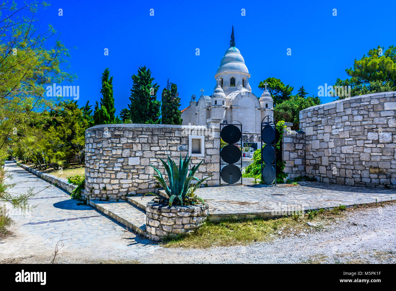 Scenic view at old ancient mausoleum in Supetar town, famous landmarks ...