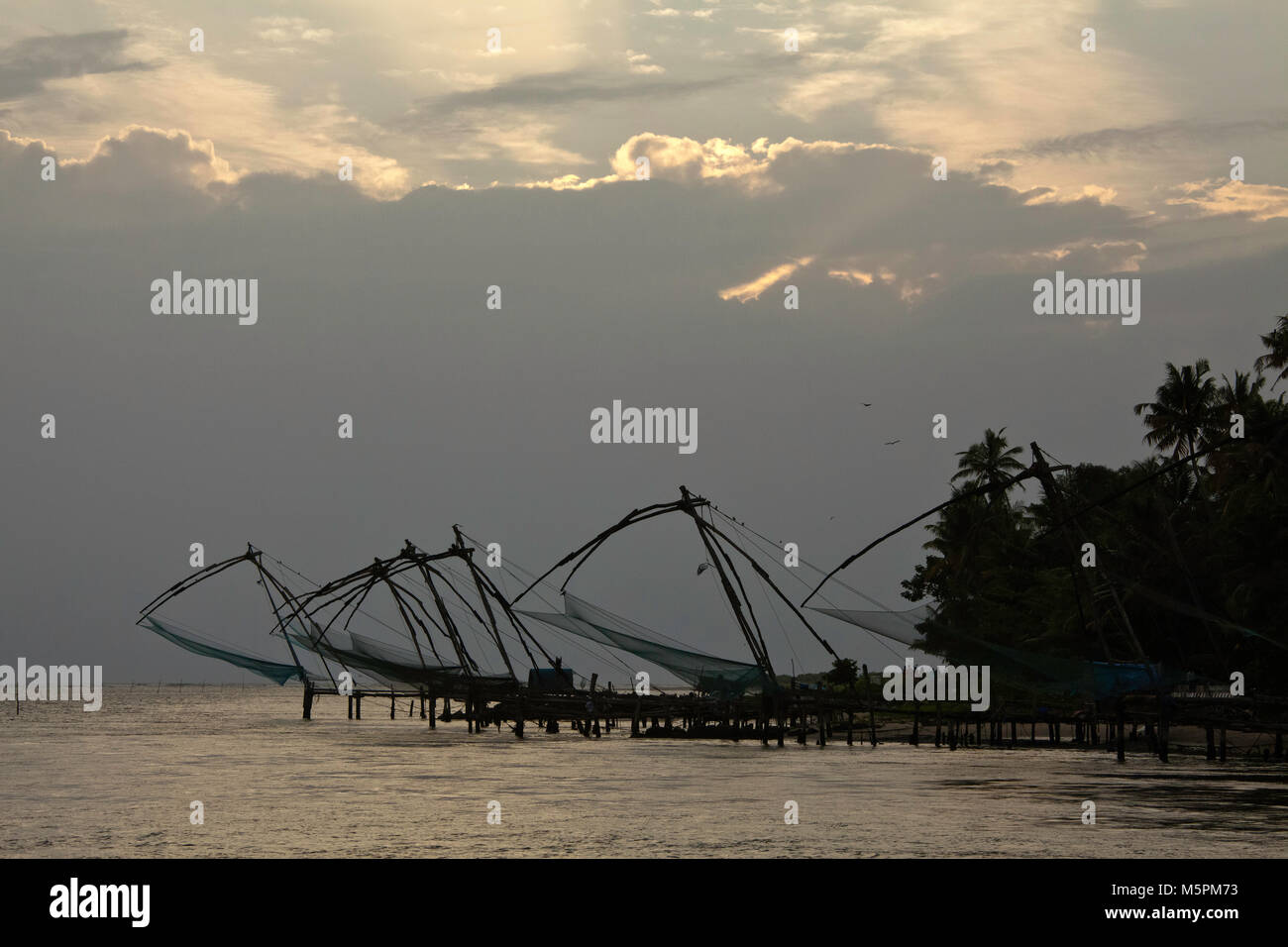 The Chinese fishing nets at sunset. From Kochi (Cochin) in Kerala ...