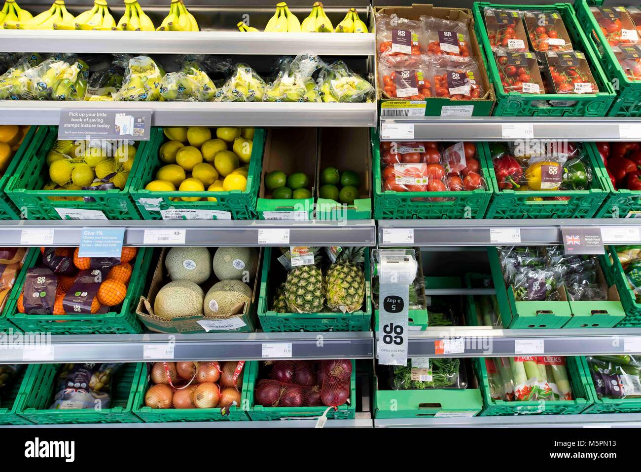 An interior view of the fruit and veg aisle of a British supermarket ...