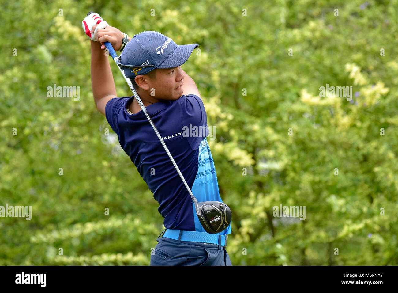 Danau, UKM Bangi - FEBRUARY 11: Marcus Lim Pang Chuen plays his tee ...