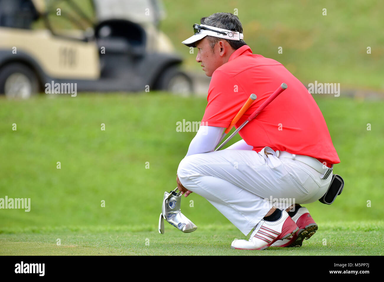 Danau, UKM Bangi - FEBRUARY 11: Audrey Chin Yen Xing's caddie lines up ...