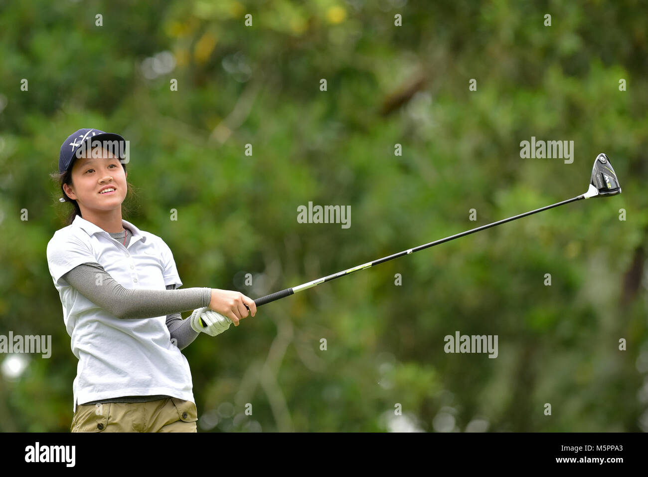 Danau, UKM Bangi - FEBRUARY 11: Ashley Chin Yen Ling, watches her tee ...