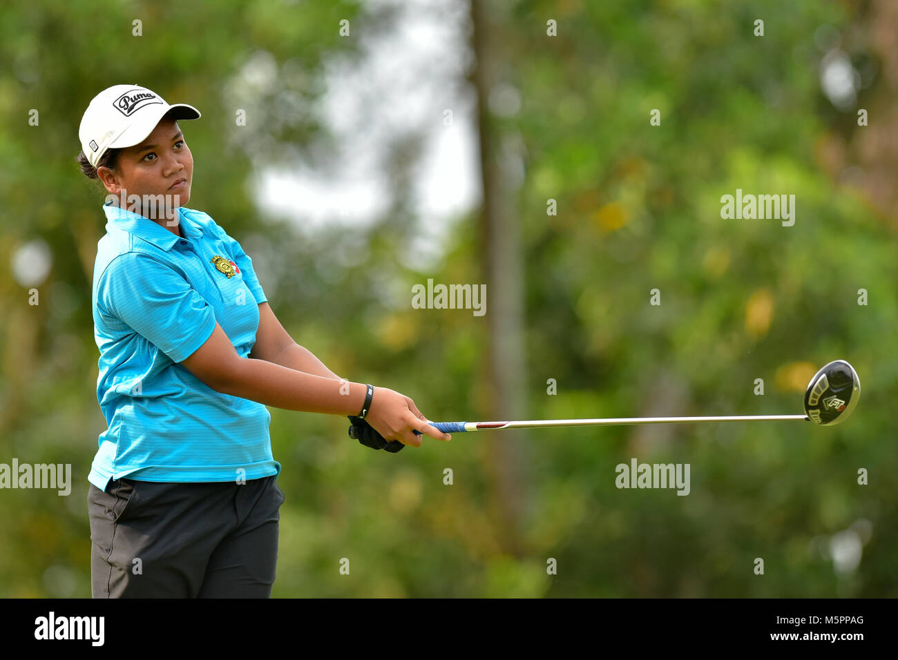 Danau, UKM Bangi - FEBRUARY 11: Zarith Sofea watches her tee shot on ...