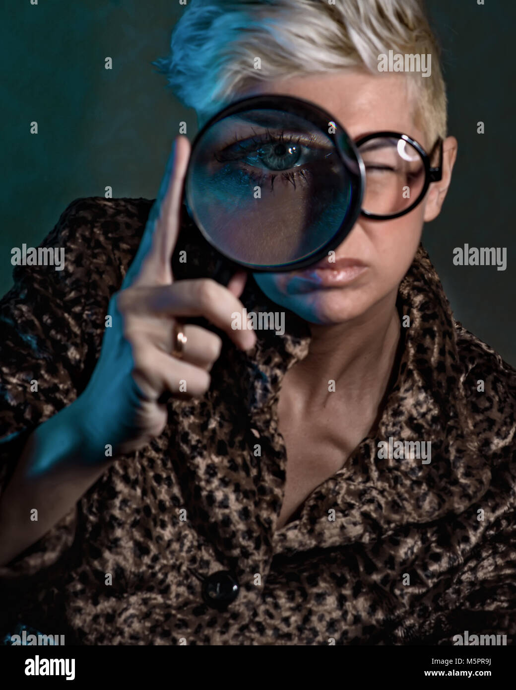 look through the magnifying glass Stock Photo - Alamy