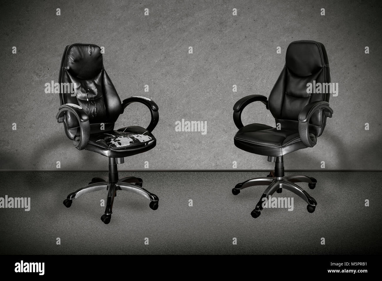 two office chairs, new and old shabby on a gray background Stock Photo ...
