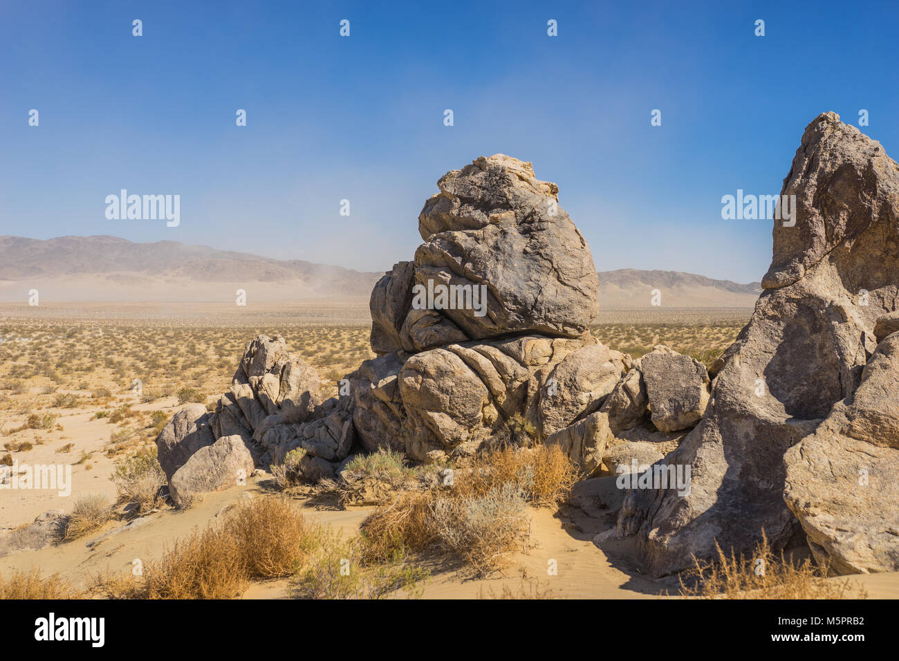 Sandstone geological rock formations stand in the wilderness of the ...