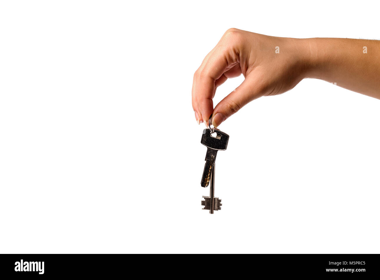 keys in hand isolated on white background Stock Photo - Alamy