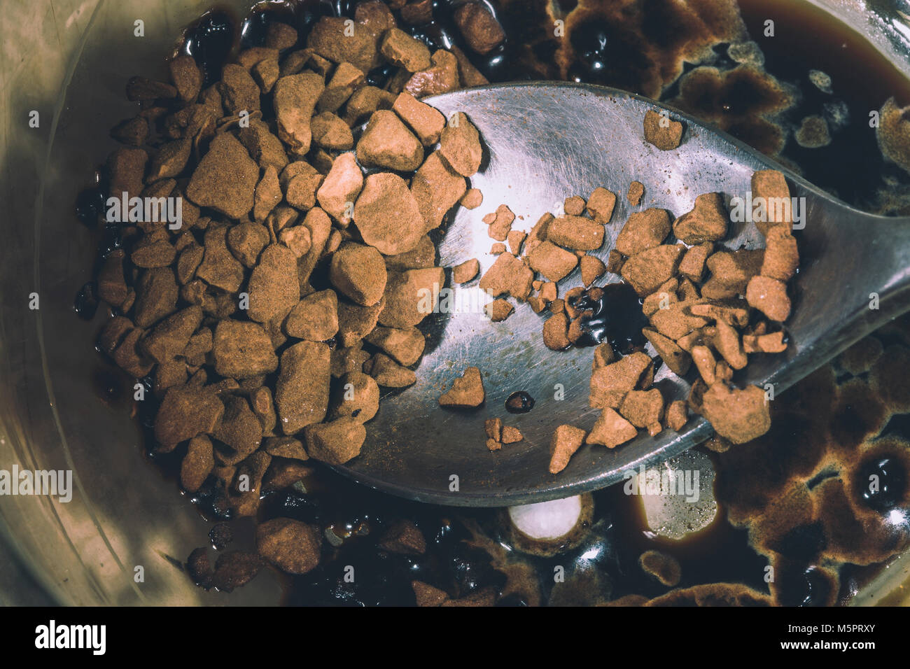 soluble coffee in a spoon in the foreground, background image Stock ...