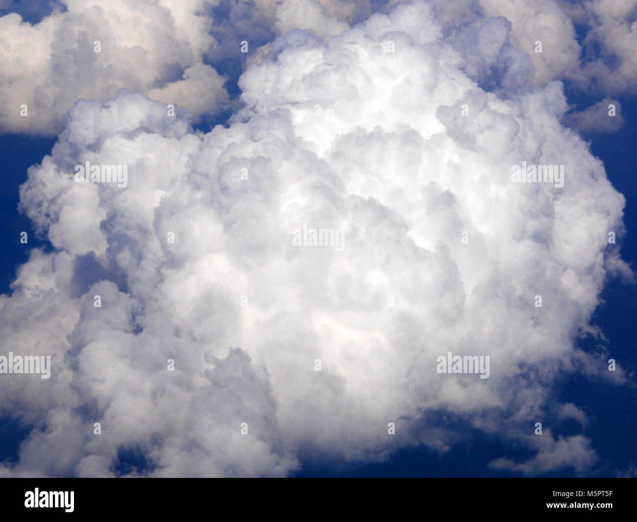 Big ball of clouds in aerial view on blue sky Stock Photo - Alamy