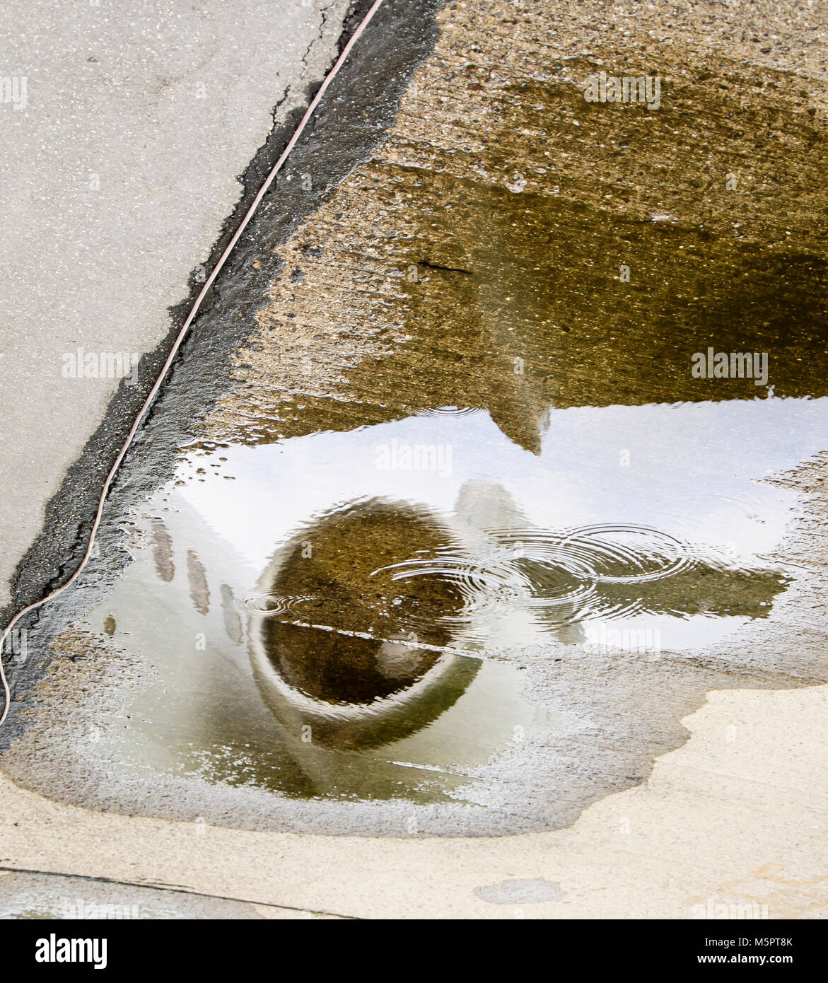 MD80 Airplane Engine Reflected in a Water Puddle Stock Photo - Alamy