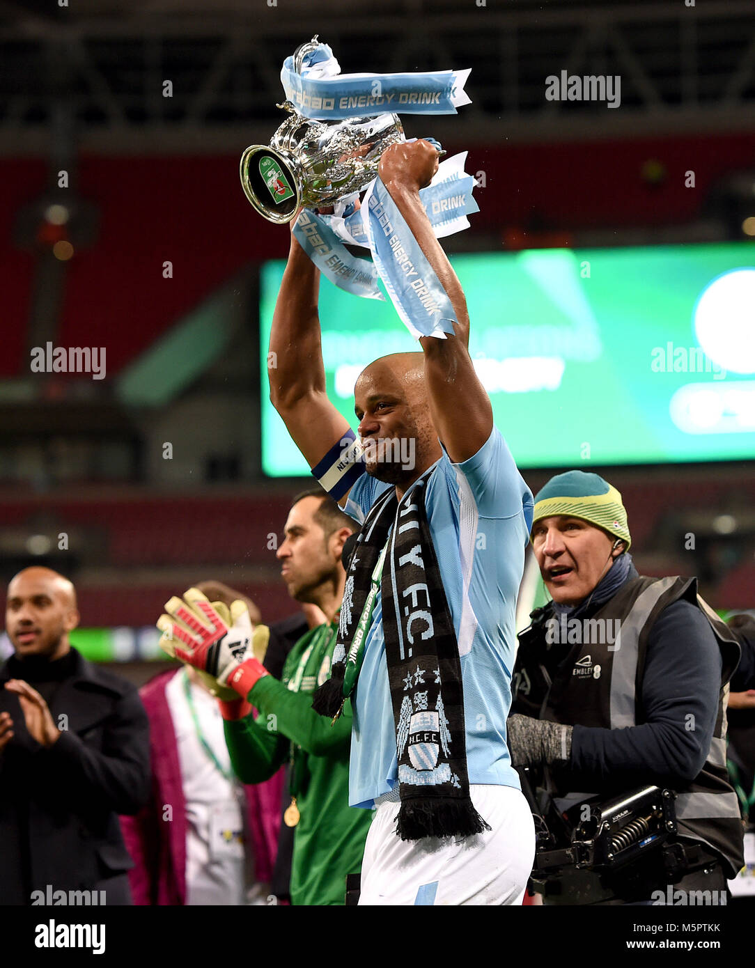 Manchester City's Vincent Kompany celebrates with the trophy during the ...