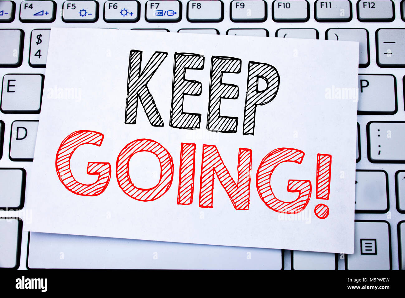 Handwritten text caption showing Keep Going. Business concept writing ...