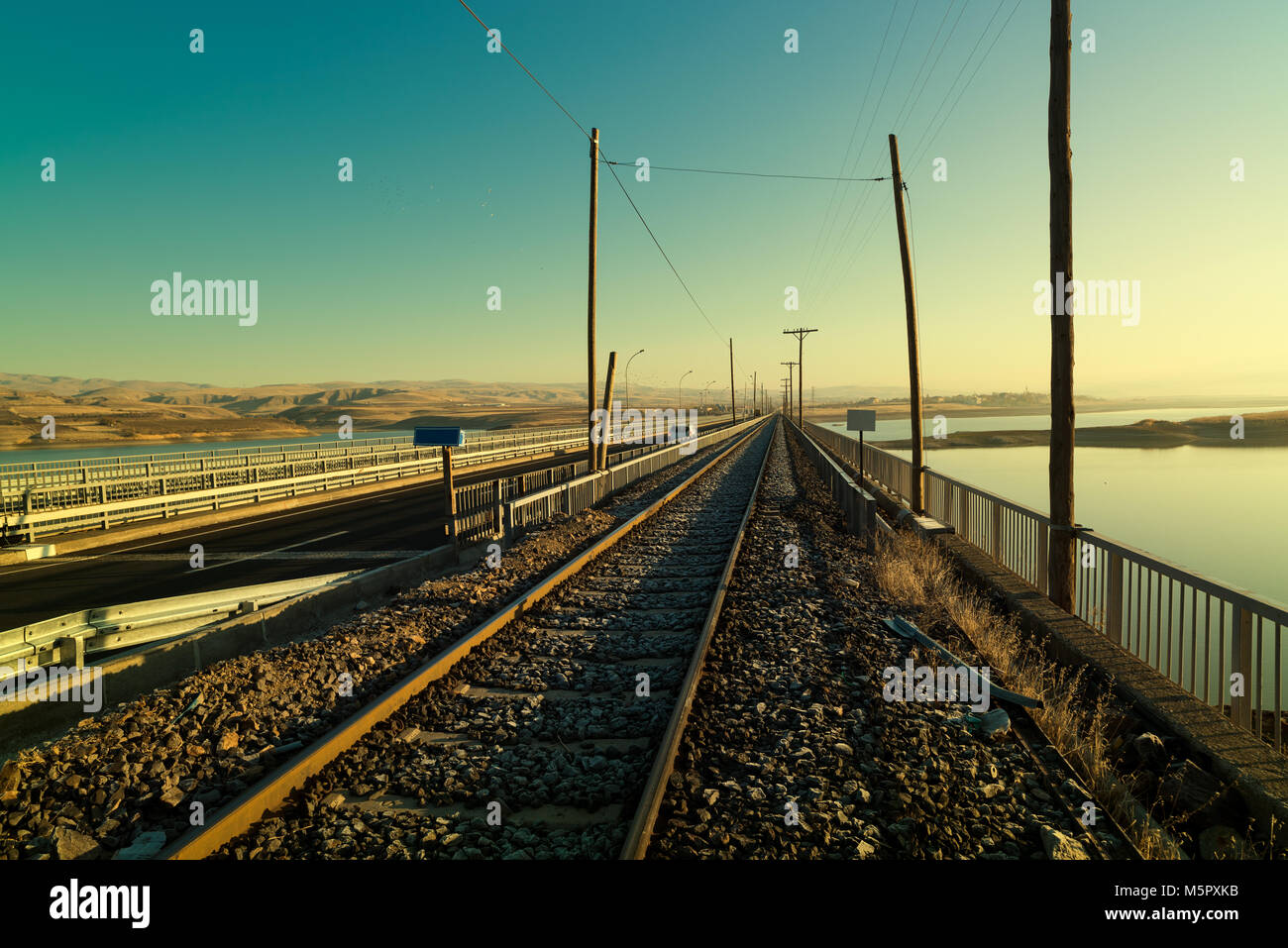 Sunrise over the railway Stock Photo - Alamy